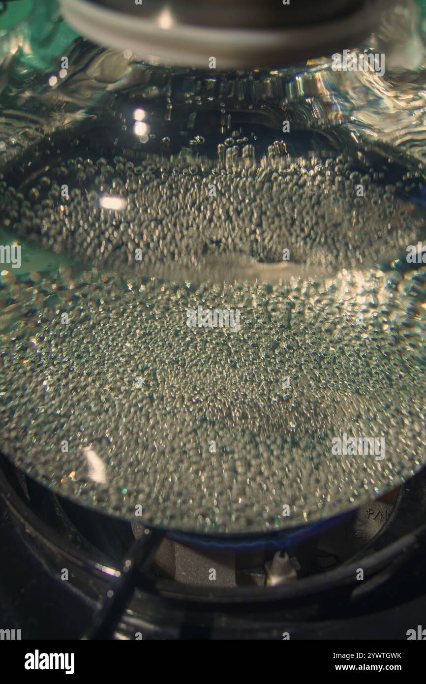 A CloseUp View of Bubbling Water Under a Glass Lid, Capturing the Intricacies of the Scene Stock ...