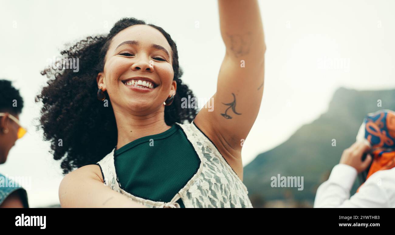 Woman, portrait and dancing on beach outdoor with energy, movement and ...