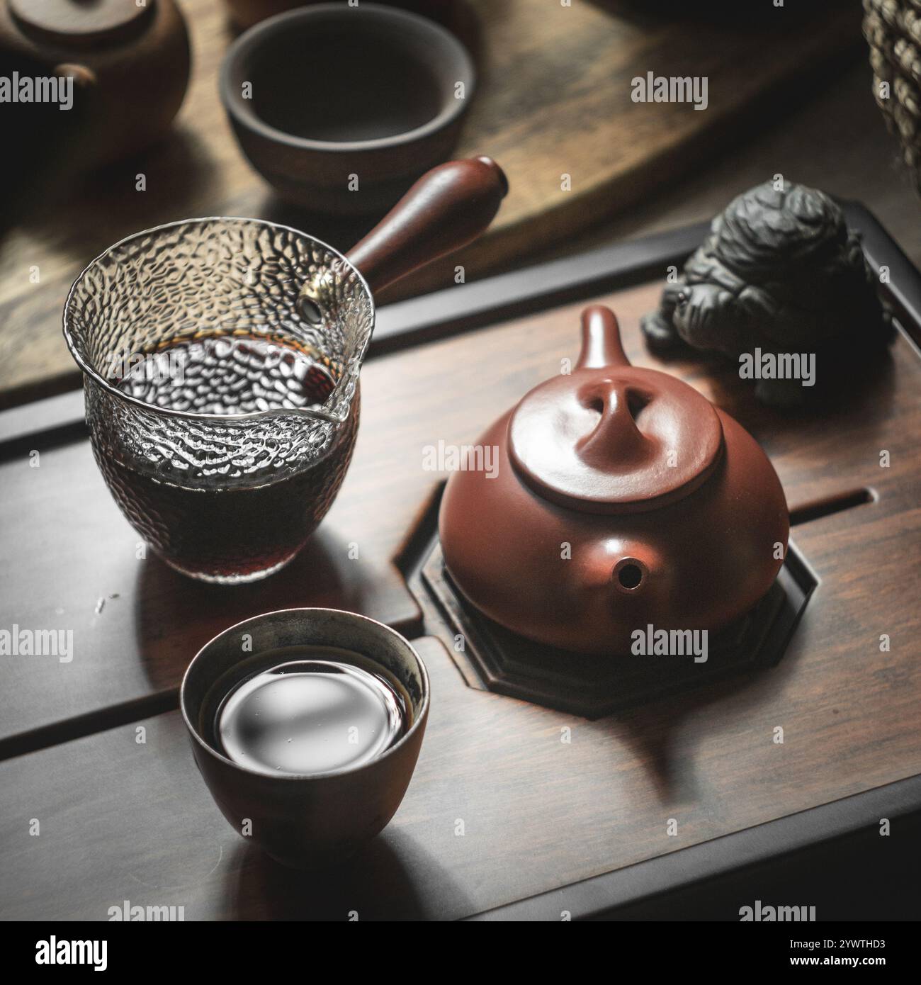 An Elegant Tea Ceremony Setup Featuring Traditional Utensils and ...