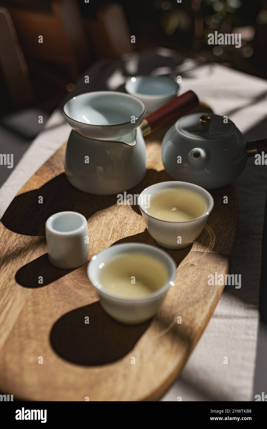 A Beautiful Traditional Tea Set Arranged on a Charming Wooden Tray that ...