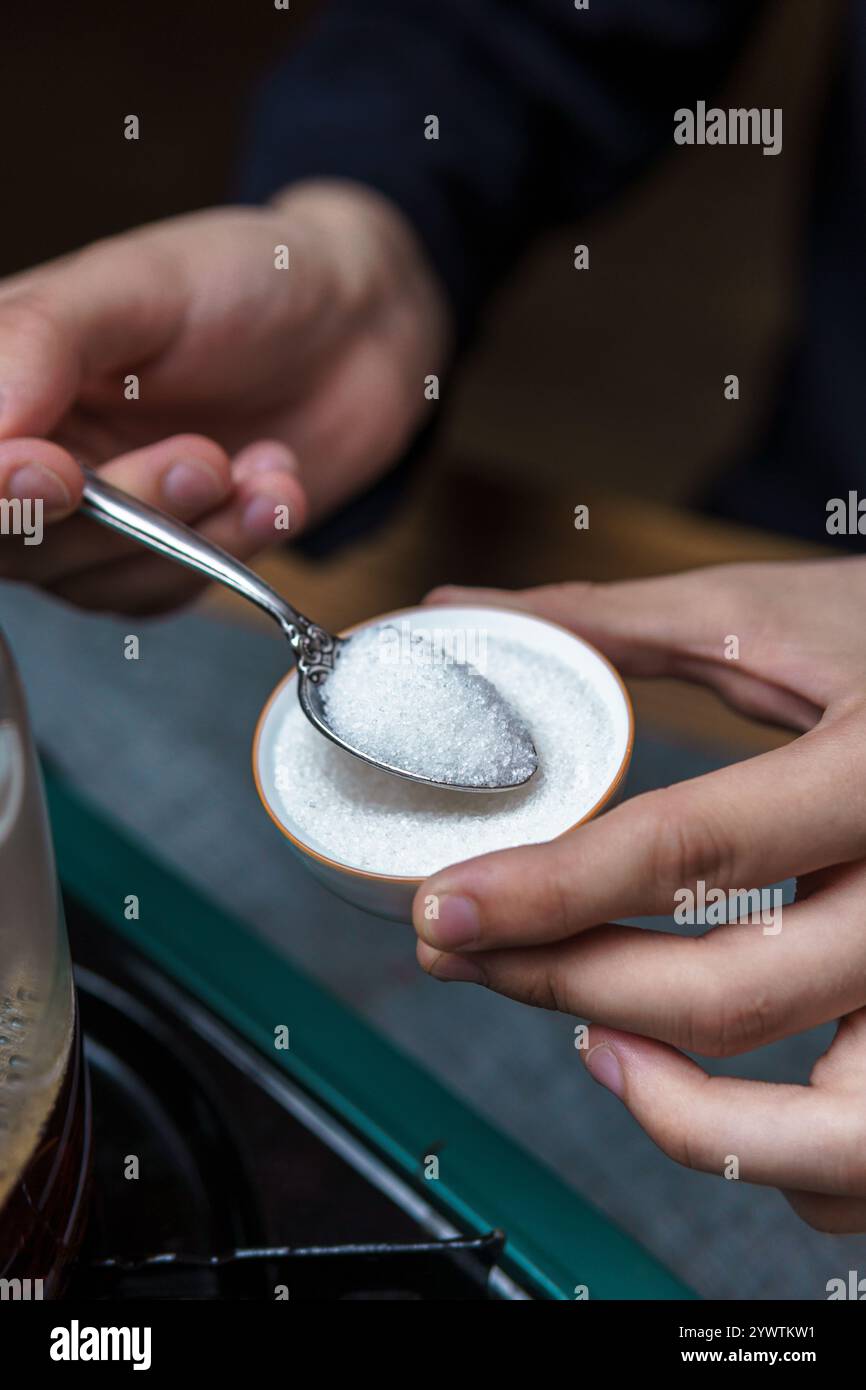 The process of measuring sugar accurately is essential for effective ...
