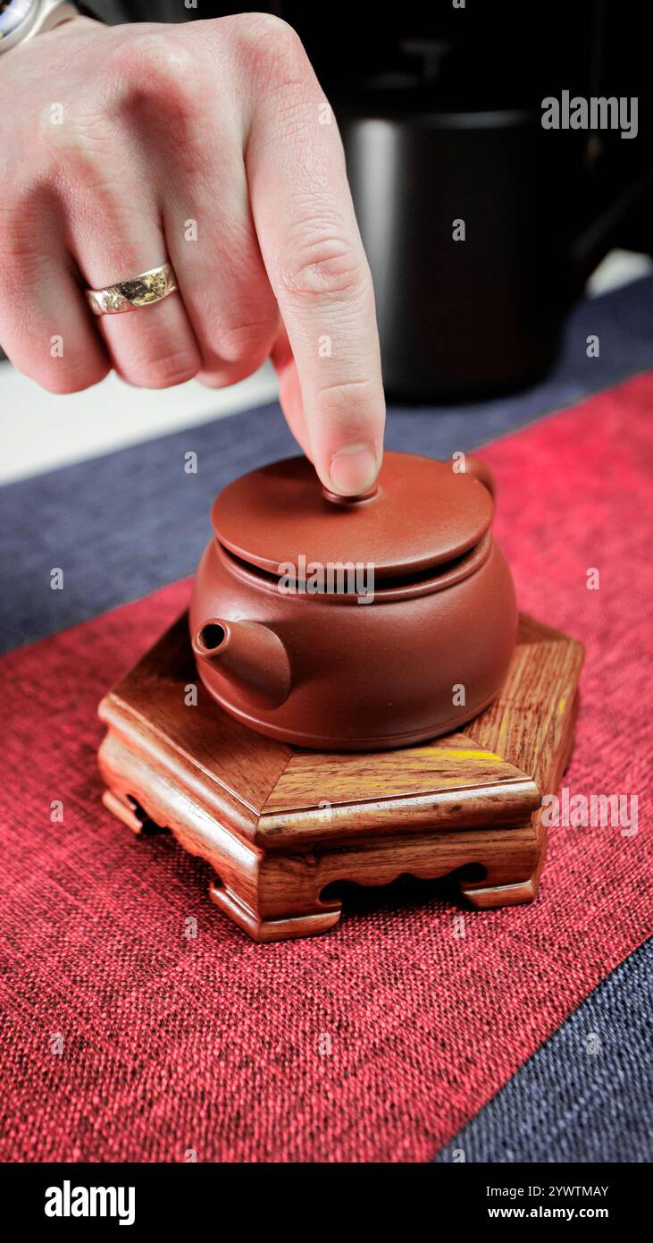 The traditional tea ceremony featuring a clay teapot is a remarkable ...