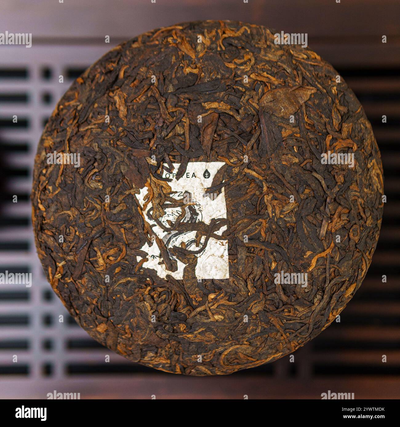 This exquisite Premium Compressed Puerh Tea Cake is a delightful choice ...