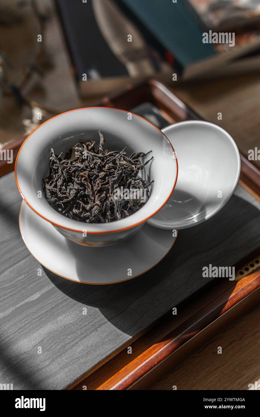 Elegant Tea Preparation Featuring Dried Leaves Displayed in a ...