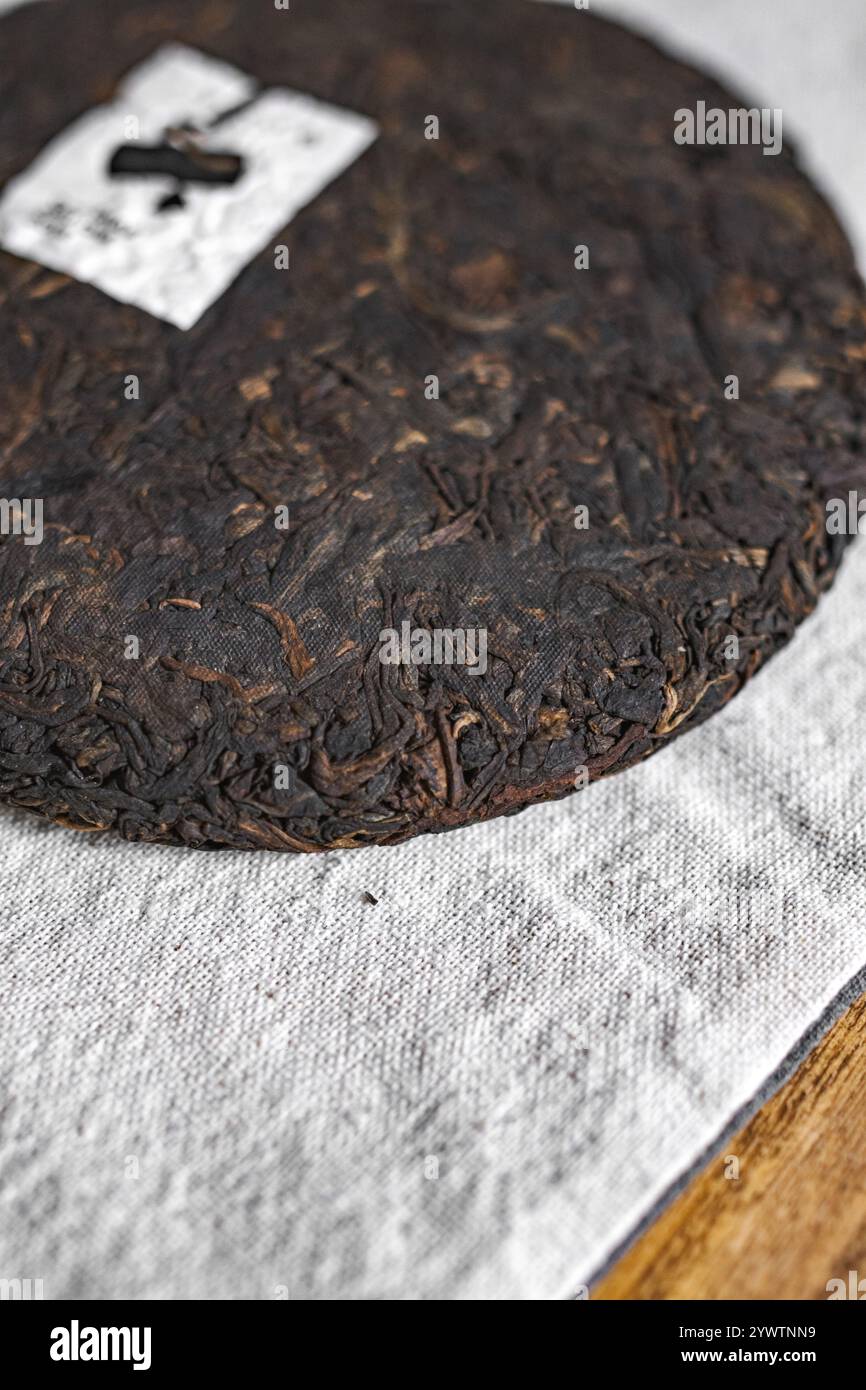 A Detailed CloseUp of a Compressed PuErh Tea Cake, Showcasing its ...