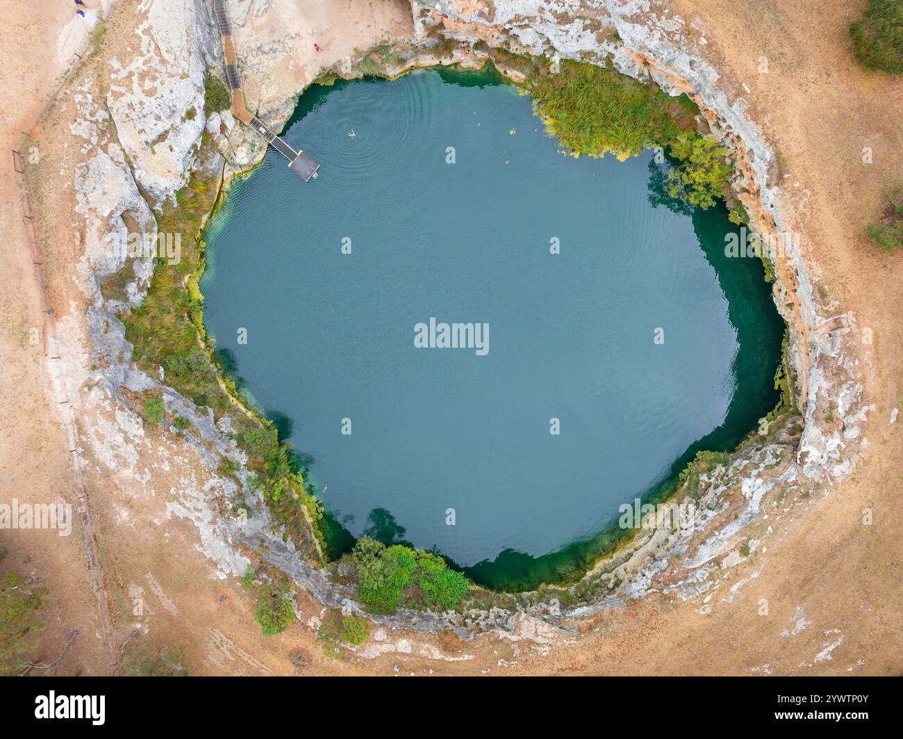 Aerial view of a lake in a limestone sinkhole at Mount Schank in South ...