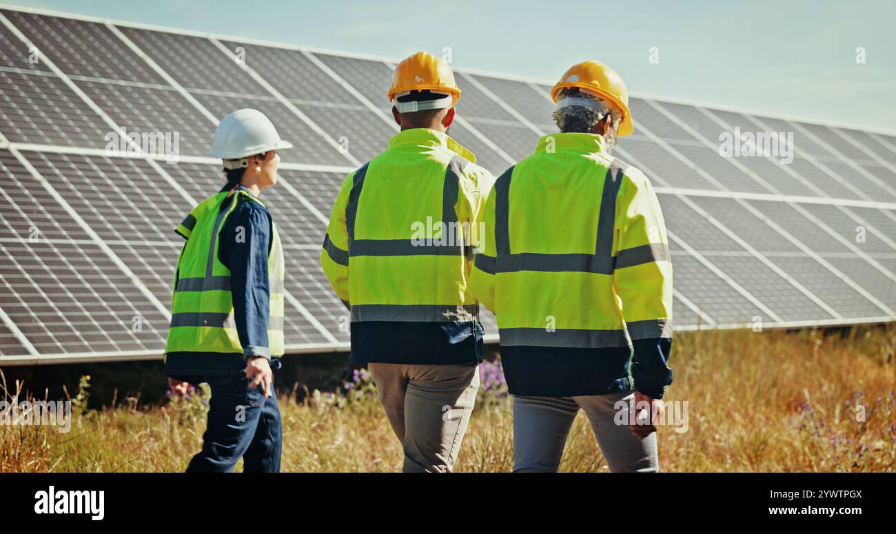 Solar panel, walking and back with people, teamwork and cooperation for ...