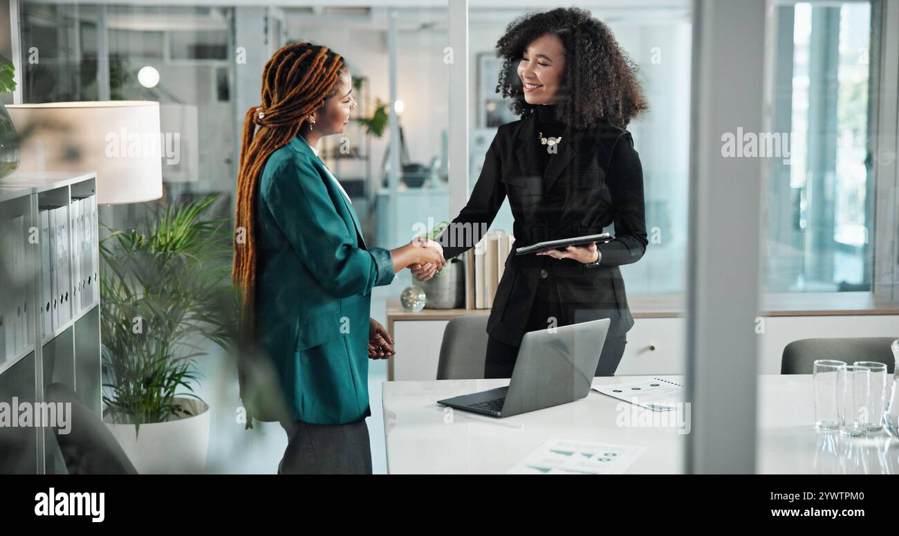 Women, tech and handshake in office for welcome, meeting and thank you ...