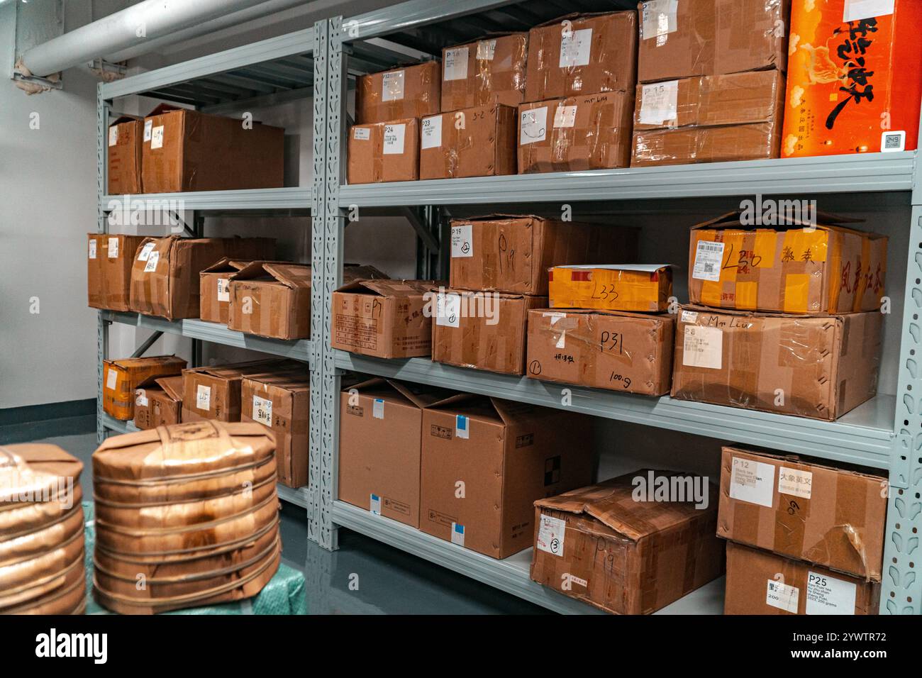 Organized storage in a warehouse is crucial, with packed boxes and ...