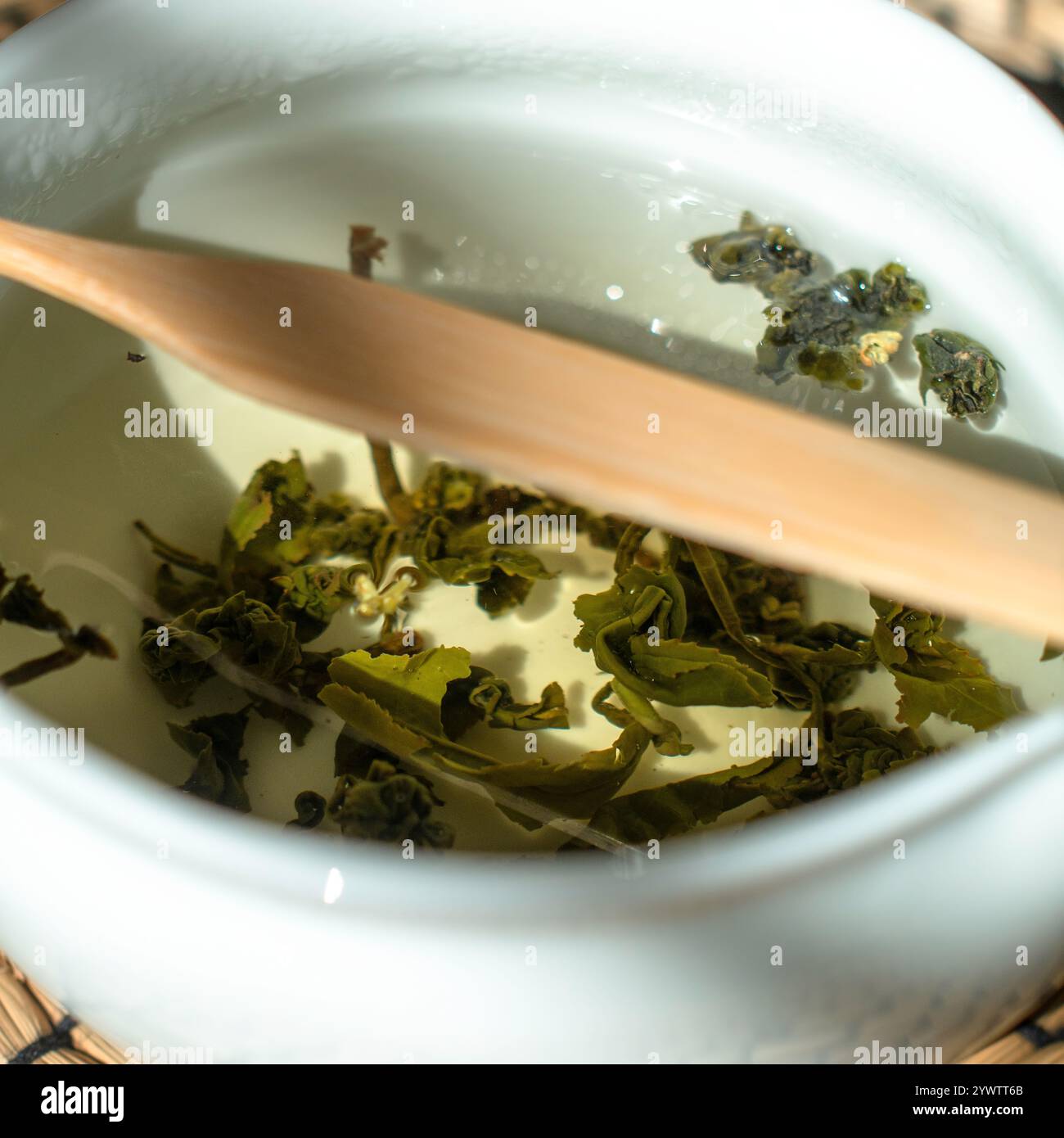 Brewing a delightful Green Tea using Fresh Leaves in a Traditional Pot ...