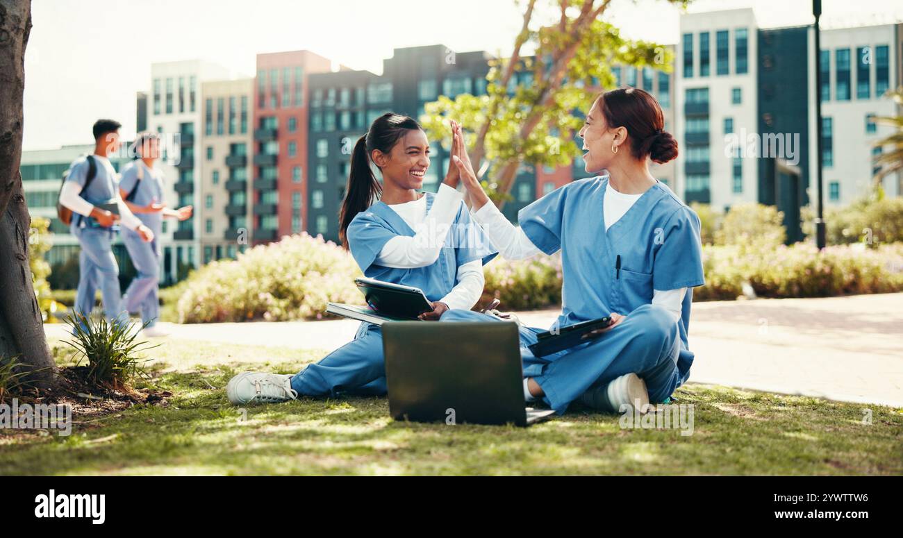 Happy women, nurse and high five with laptop for internship, medical ...