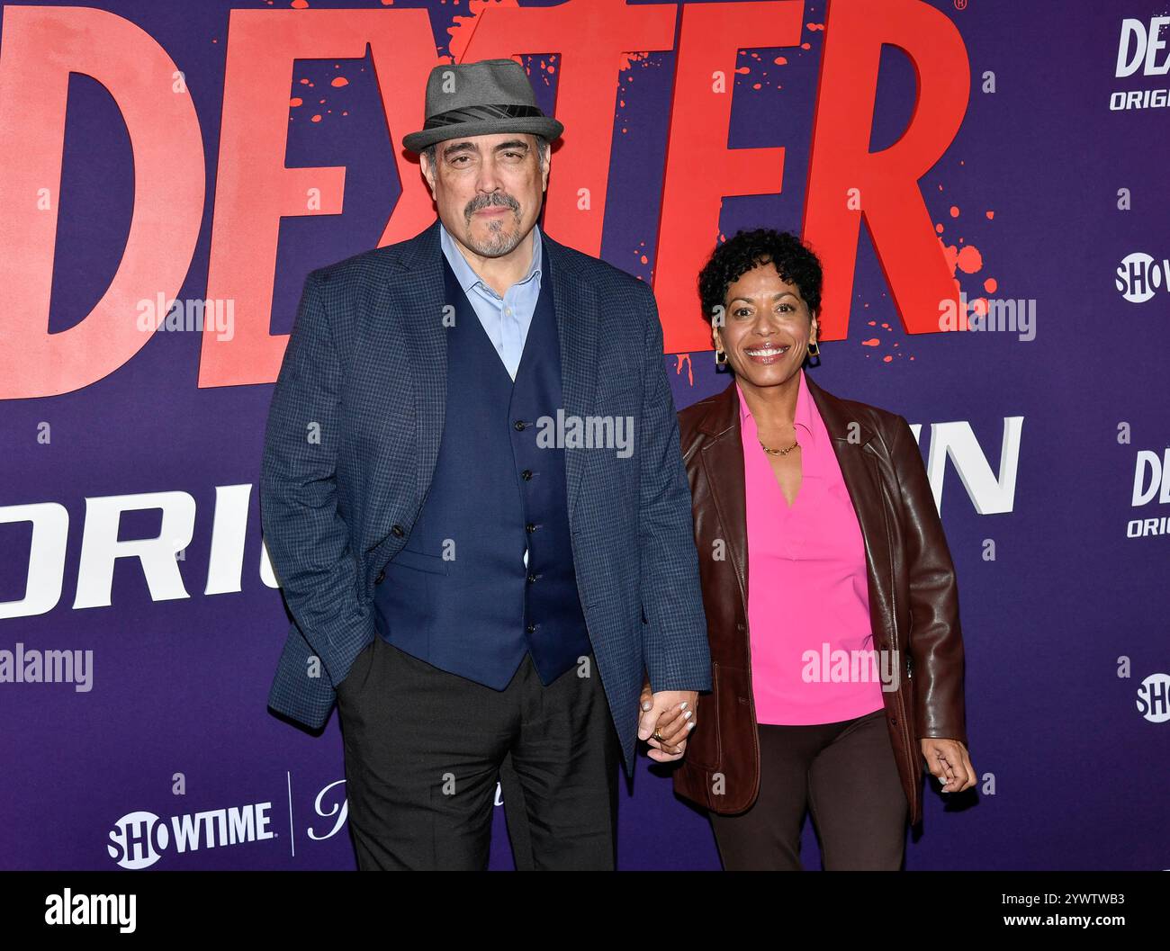 David Zayas, left, and wife Liza Colon-Zayas attend the premiere of the ...