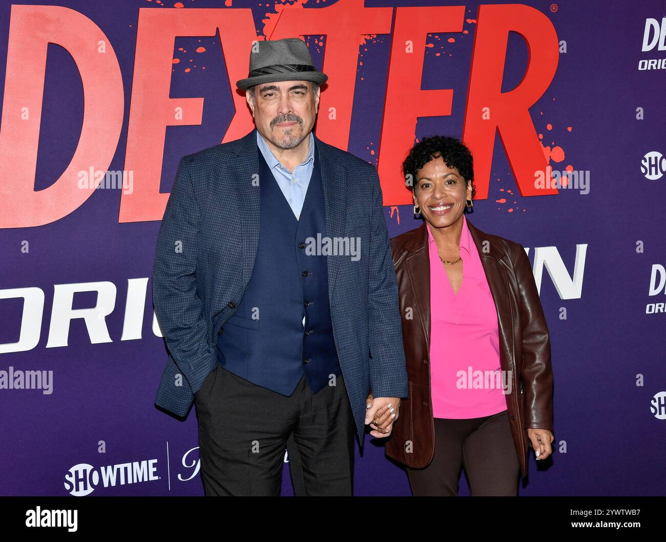 David Zayas, left, and wife Liza Colon-Zayas attend the premiere of the ...