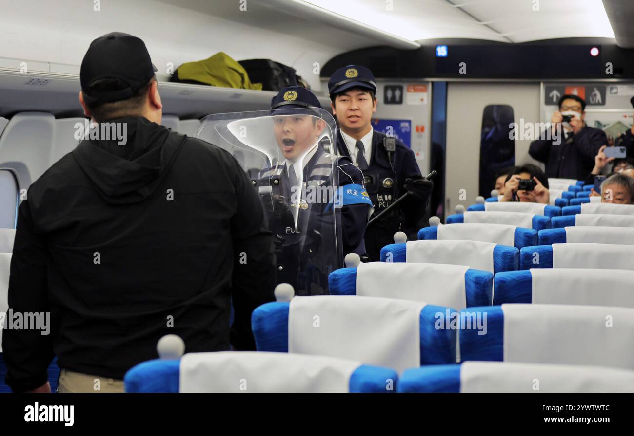 JR West train conductors and police officers from Hyogo Prefecture participate in a crime ...