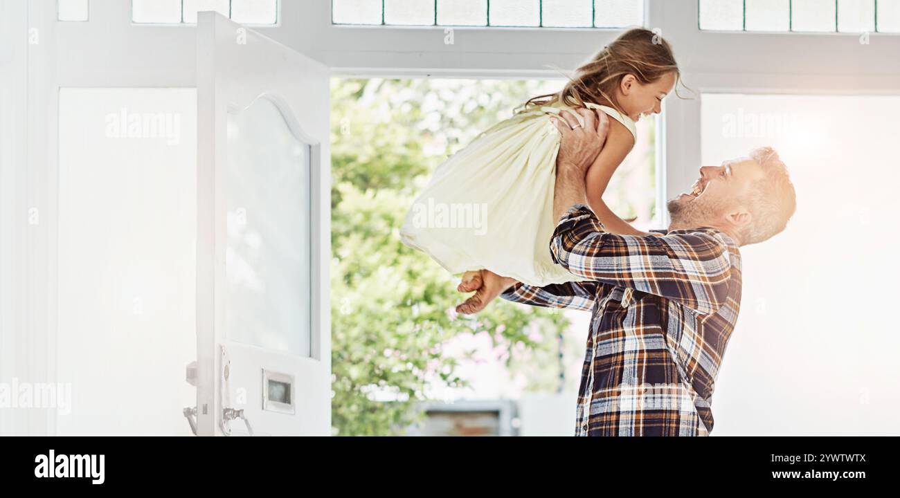 Father, laugh and lift child in home for reunion, welcome and family ...