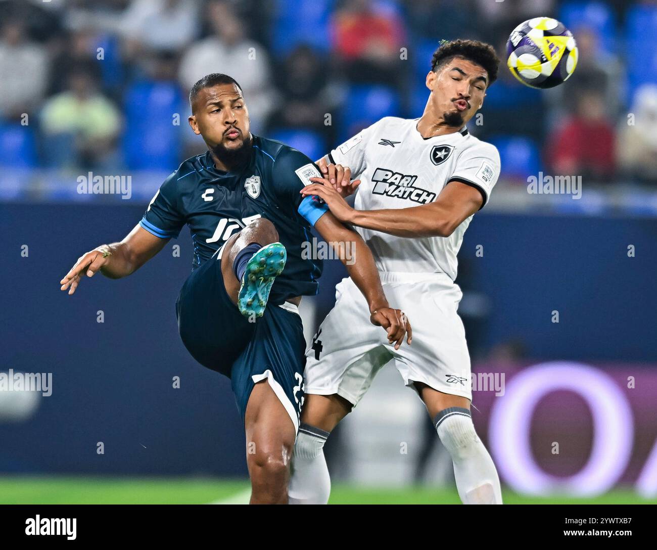 Doha. 11th Dec, 2024. Salomon Rondon (L) of CF Pachuca vies with ...