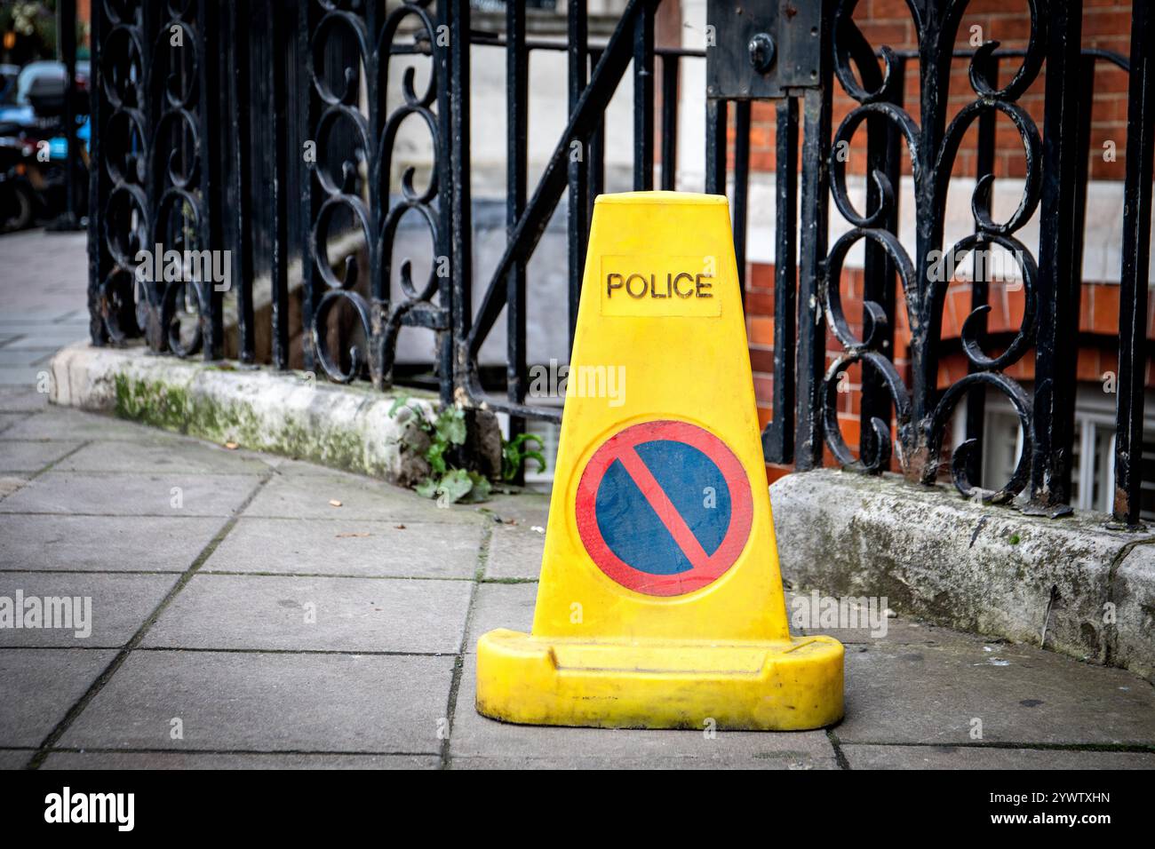 Bright yellow safety cones hi-res stock photography and images - Alamy