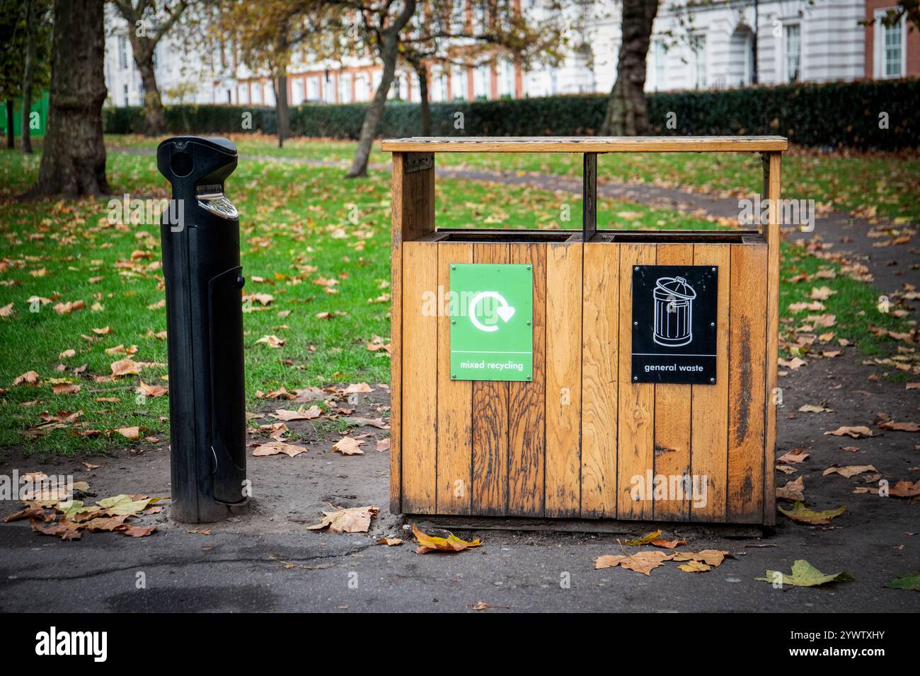 Waste sorting containers in the park. Urban environment Stock Photo - Alamy