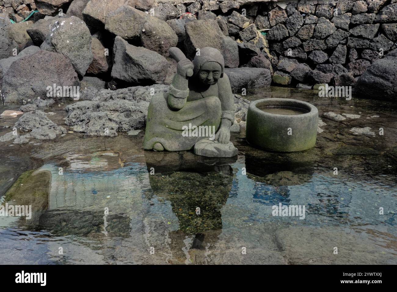 Traditional bathing pool along the Jeju Olle Trail in rural Jeju Island ...