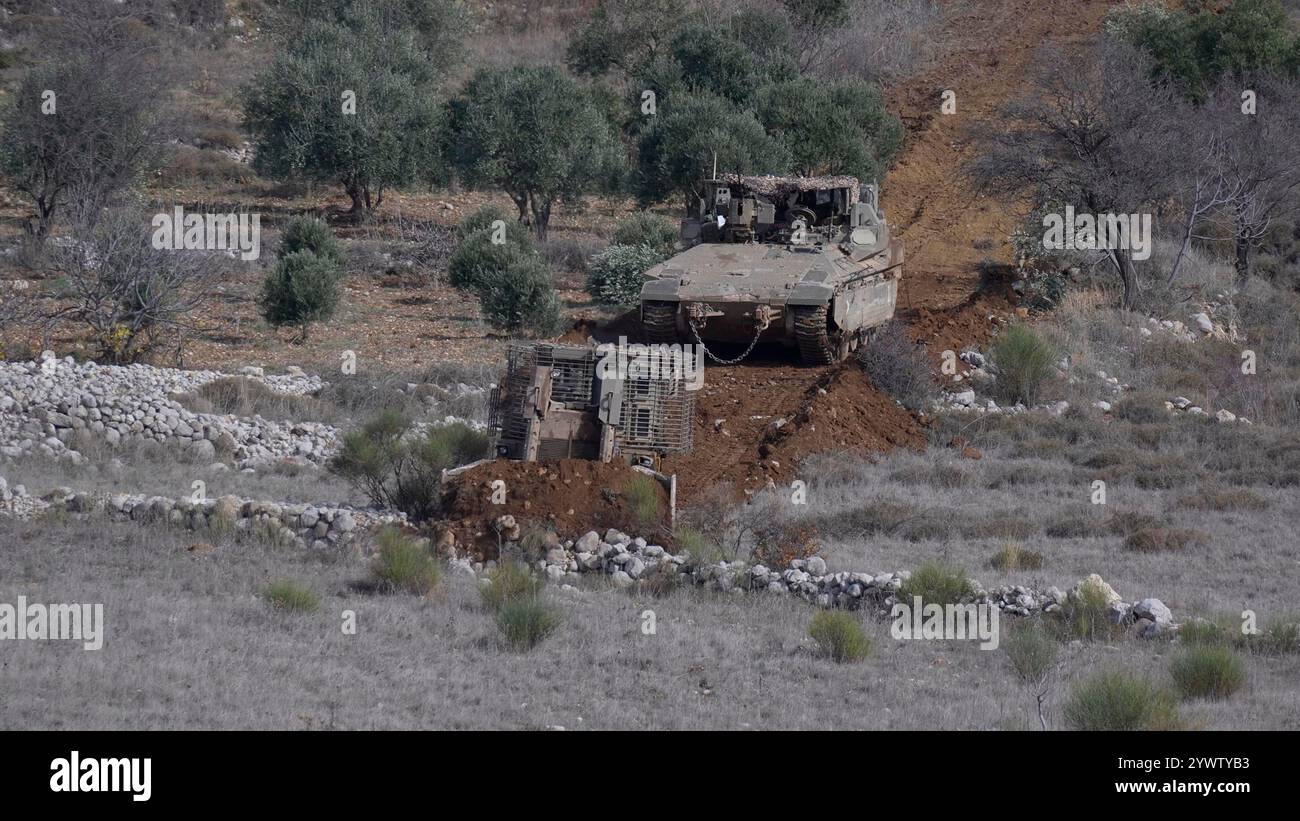 GOLAN HEIGHTS, ISRAEL- DECEMBER 11: An Israeli D9 armored military ...