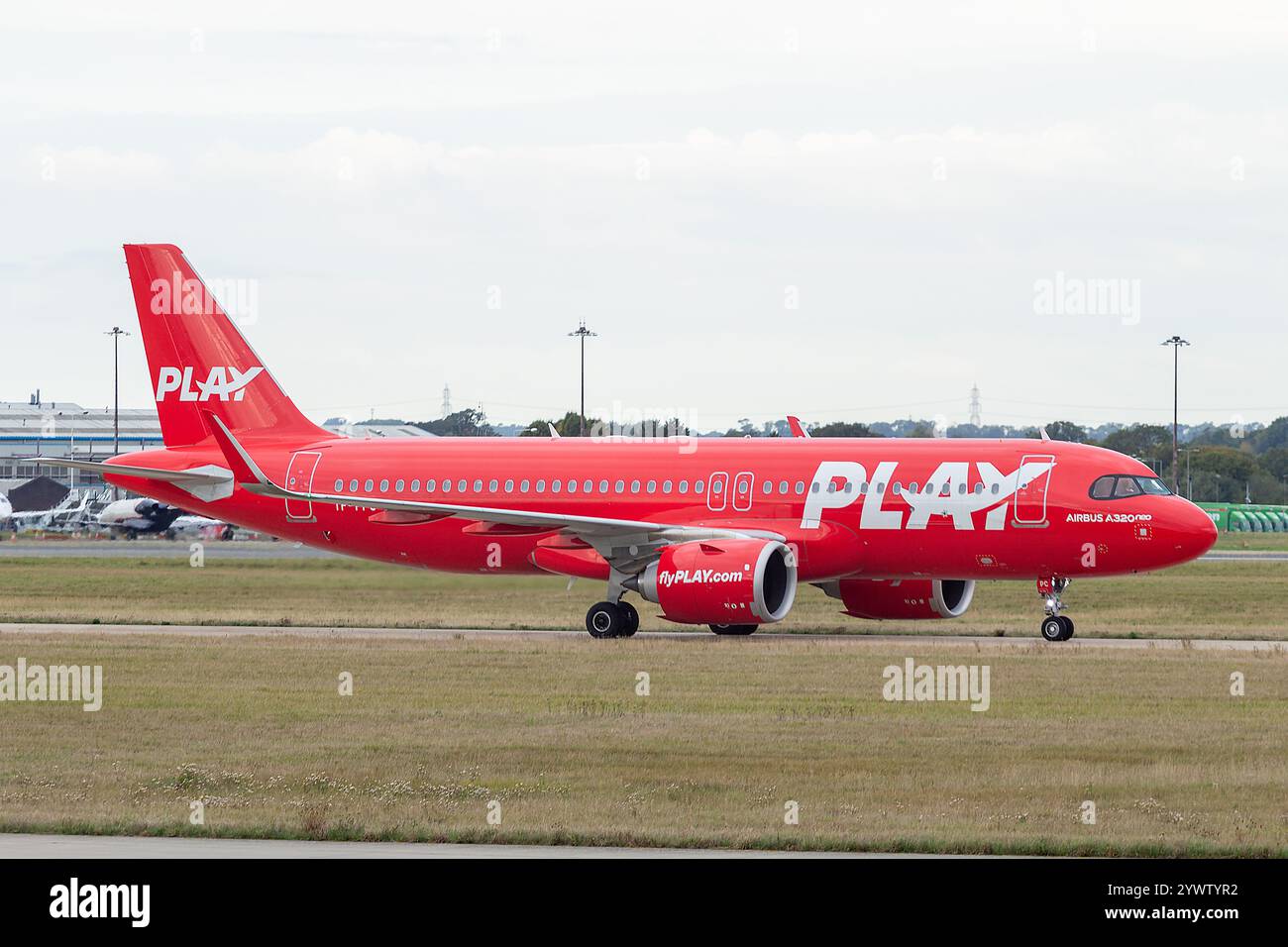 Play airlines at London Stansted. Aircraft in red with Play livery ...