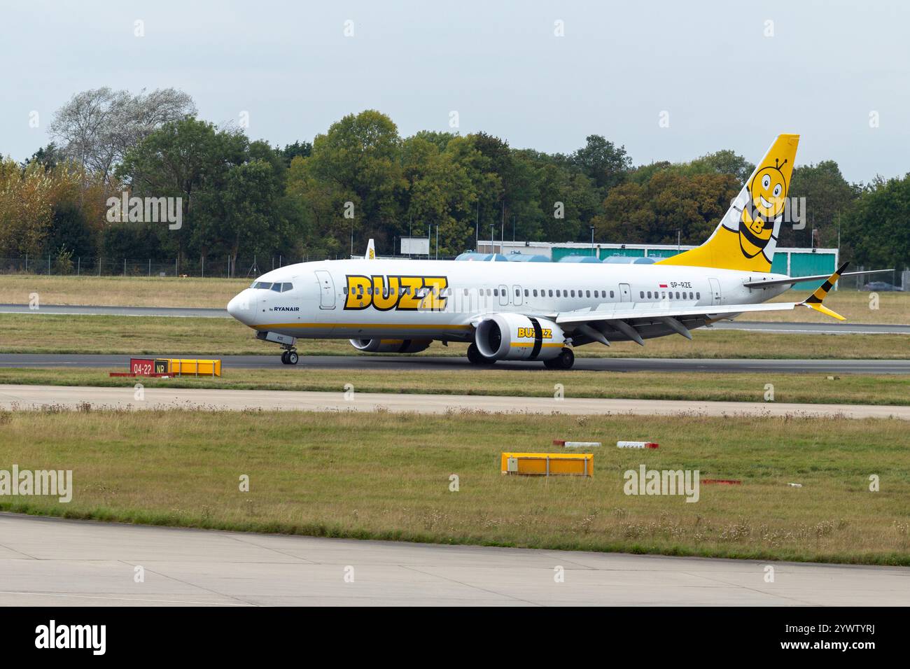 Buzz Airlines. Aircraft is white with Yellow logos. London Stansted ...