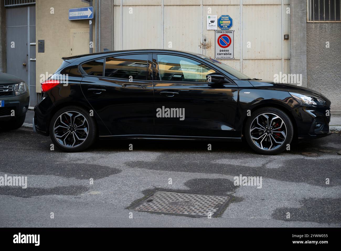 Cremona, Italy - November 27th 2024 Side view of a black ford focus st ...
