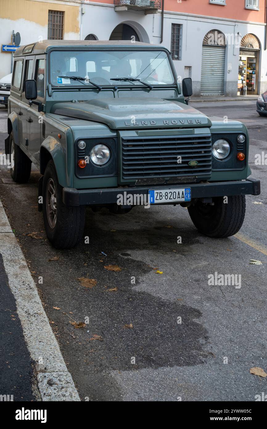 Cremona, Italy - November 27th 2024 A green land rover defender 110 ...