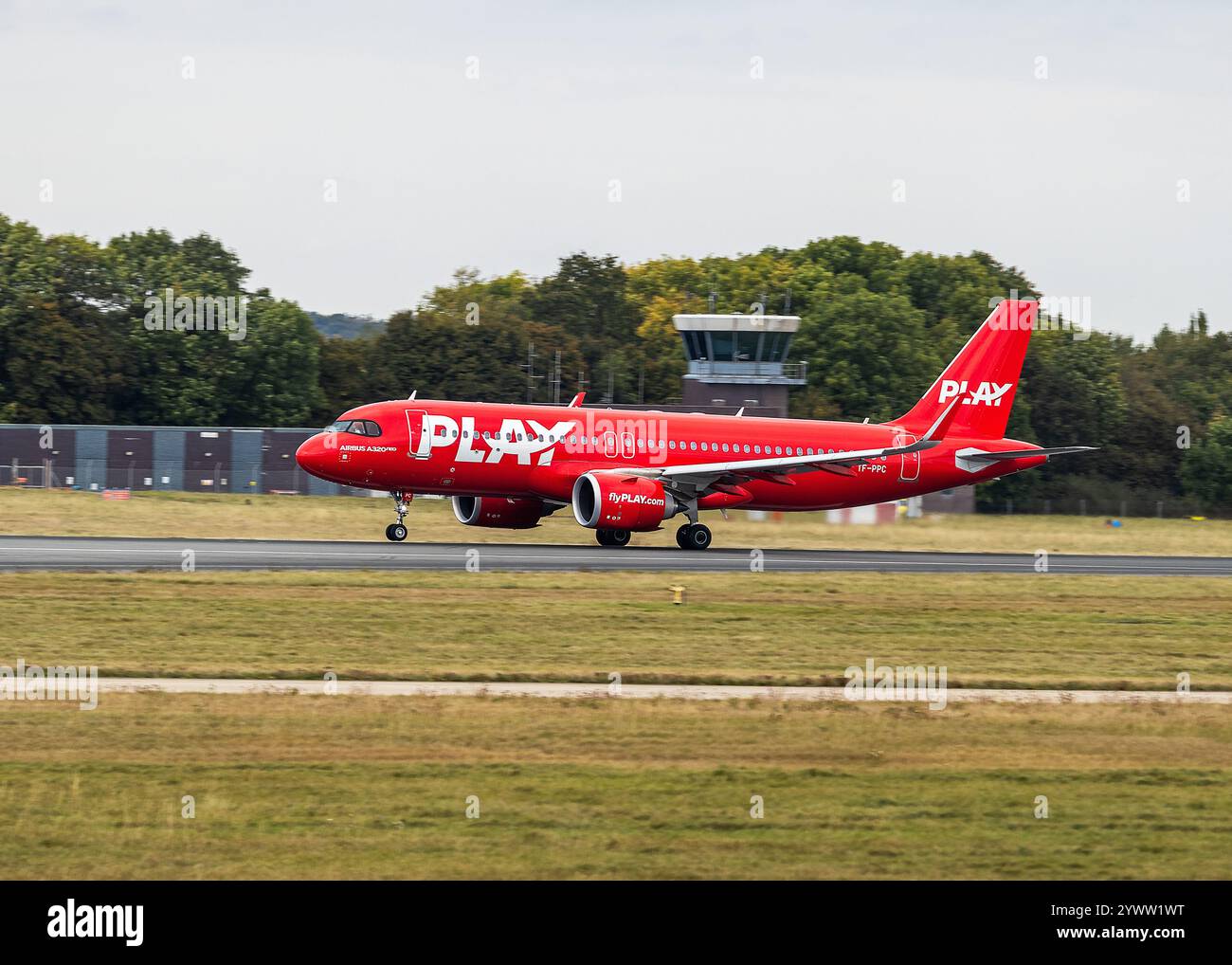 Play airlines at London Stansted. Aircraft in red with Play livery ...