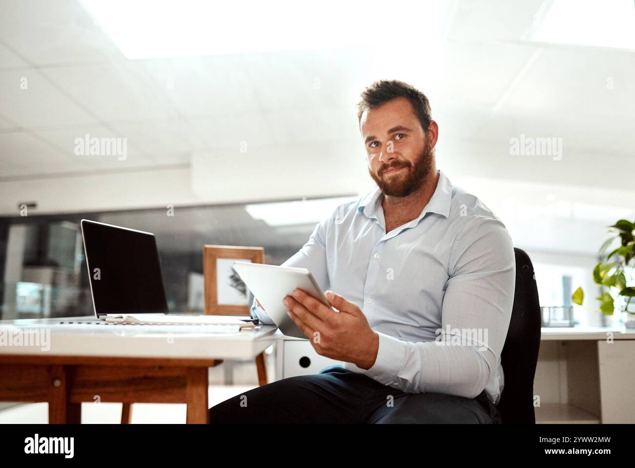 Business, man and tablet at office on portrait for research on ...
