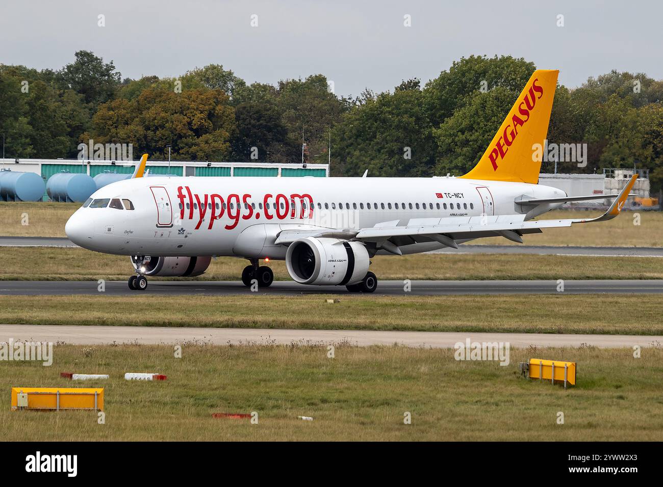 FlyPGS Airlines London Stansted. Aircraft in white and yellow livery ...