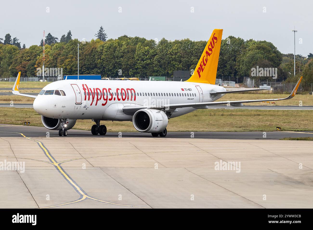 FlyPGS Airlines London Stansted. Aircraft in white and yellow livery ...