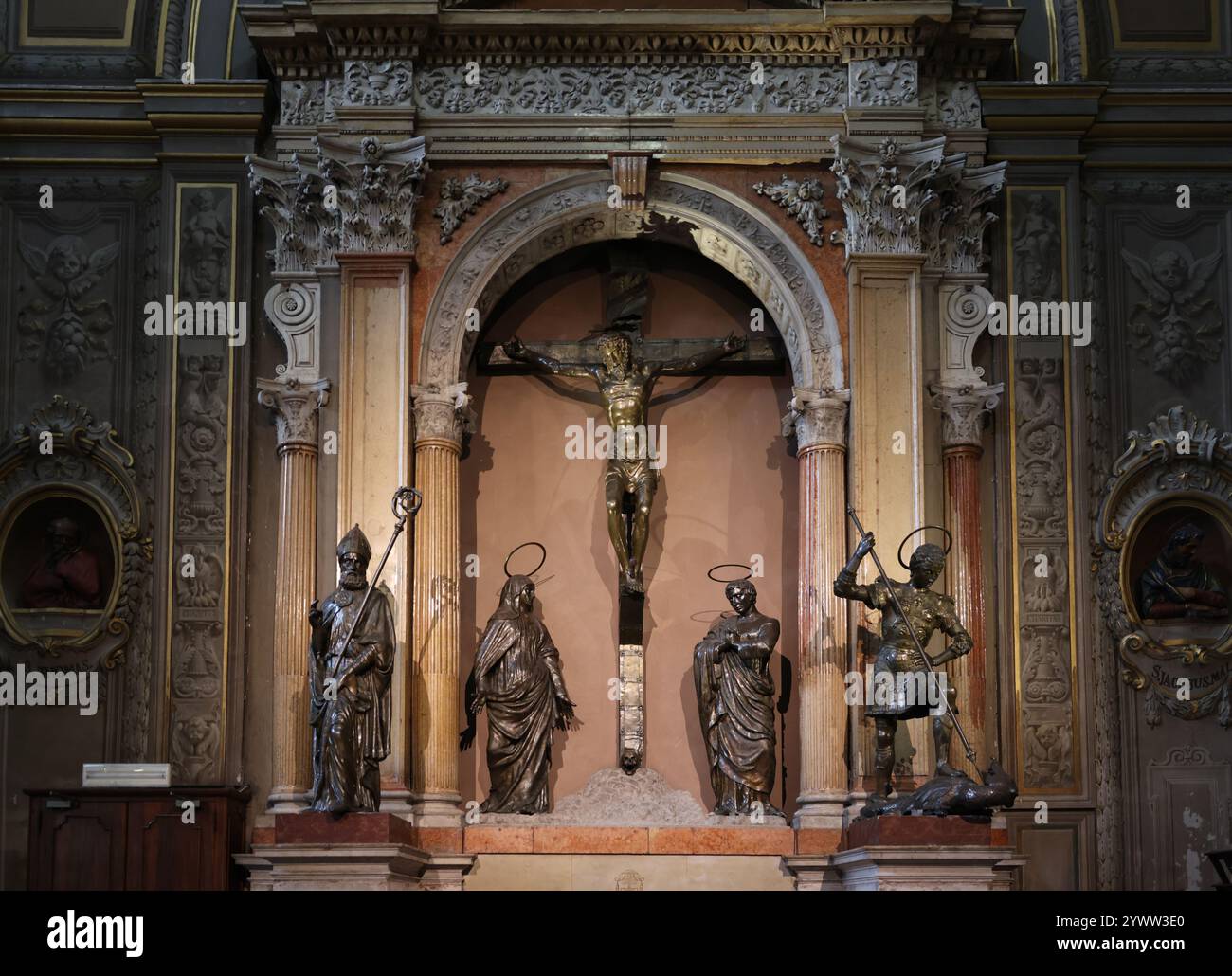 Ferrara, Italy - May 8, 2024: Bronze statues of the Crucifixion, by ...