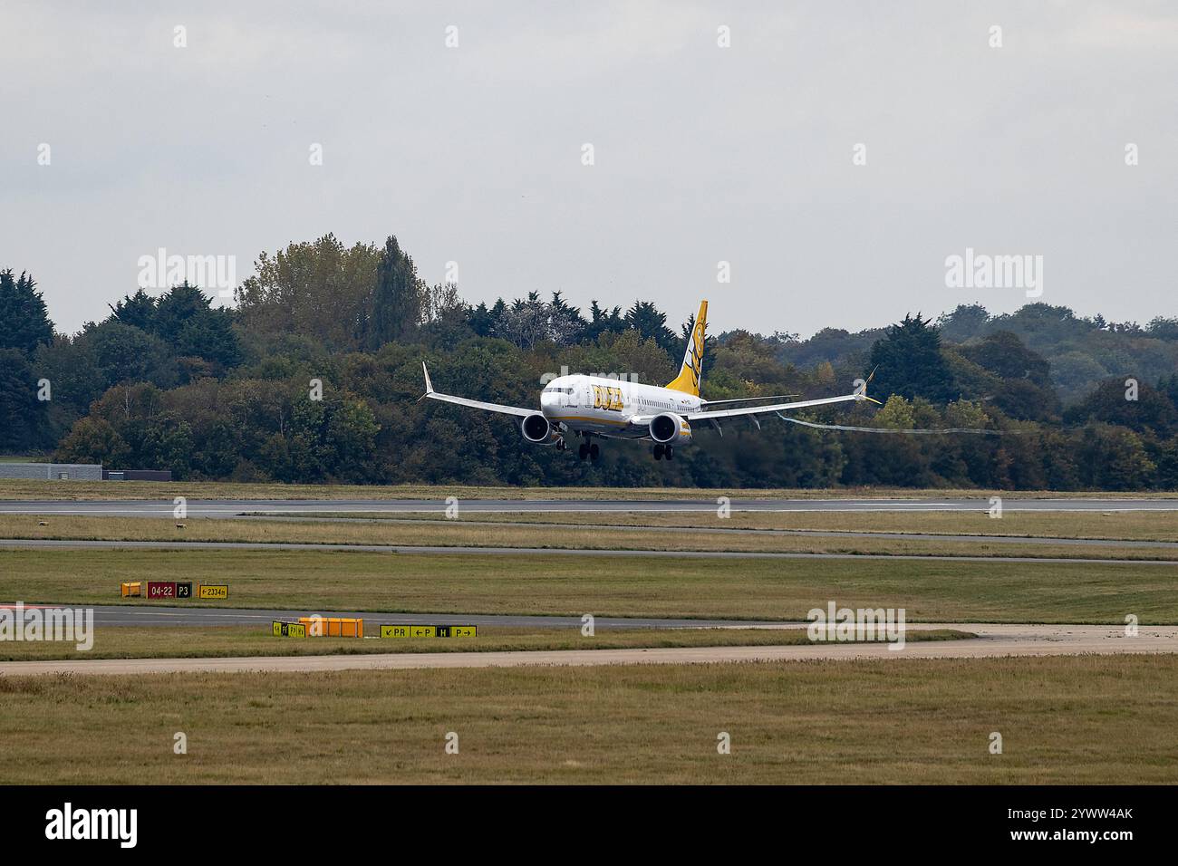 Buzz Airlines. Aircraft is white with Yellow logos. London Stansted ...