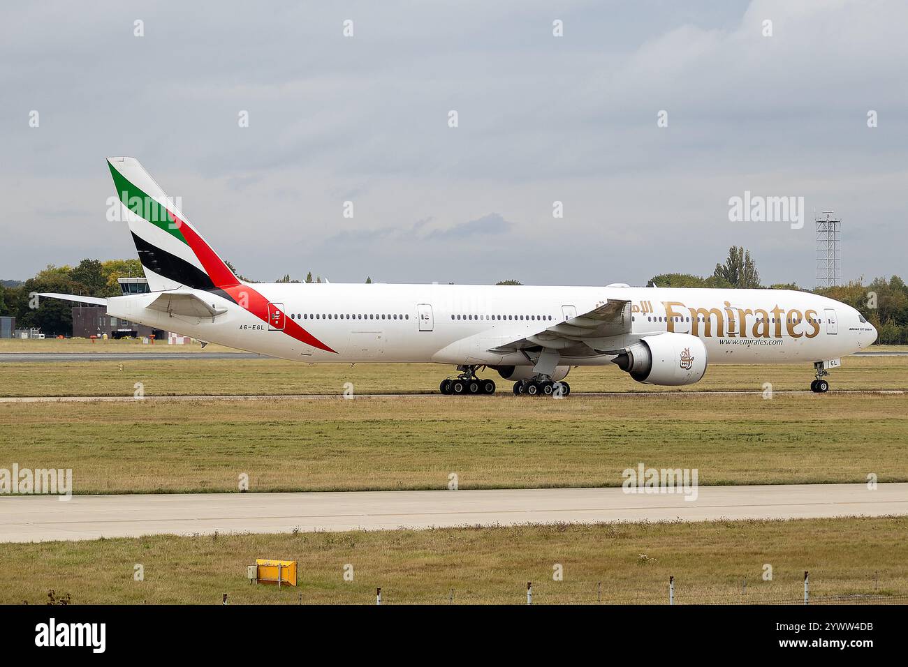 Emirates Cargo 777 London Stansted.. Aircraft is white with golden ...