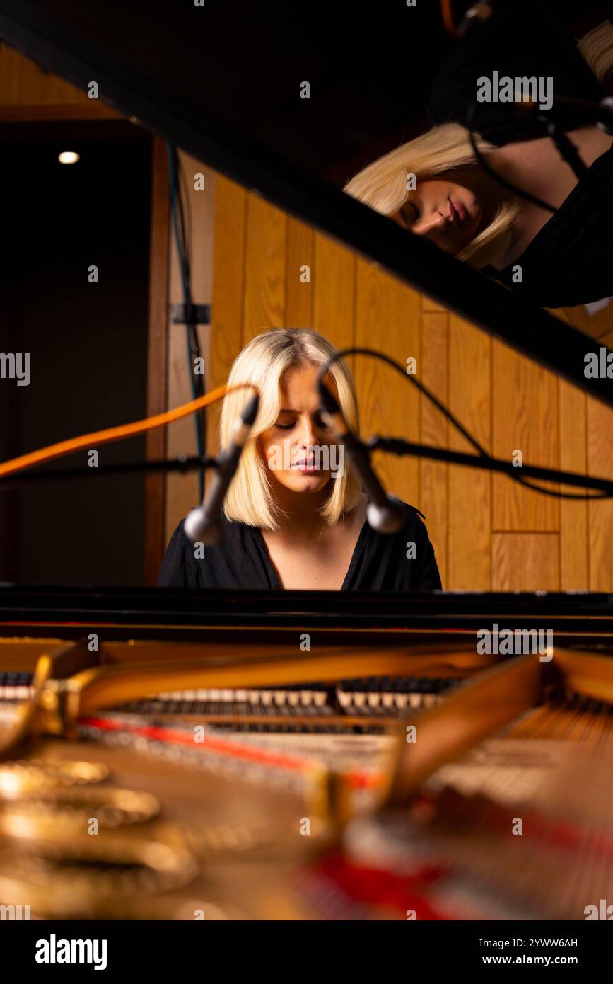 EDITORIAL USE ONLY Mel Raeburn records her version of ???Sonnet??? for ...