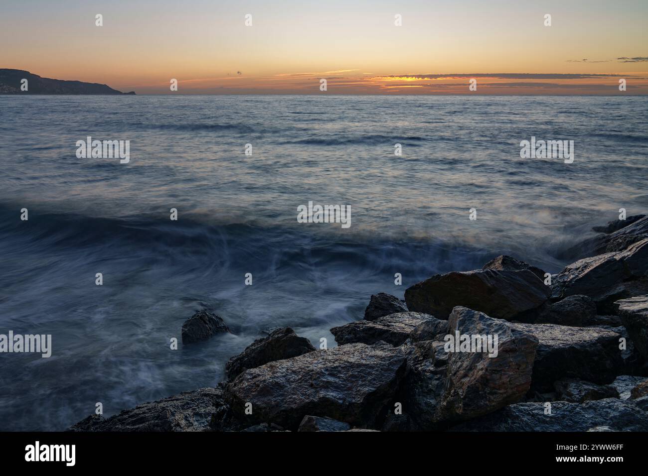 Atmospheric view of the sea, where the waves are blurred with ...