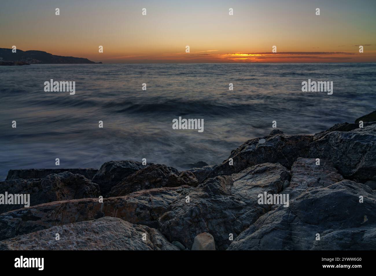Atmospheric view of the sea, where the waves are blurred with ...