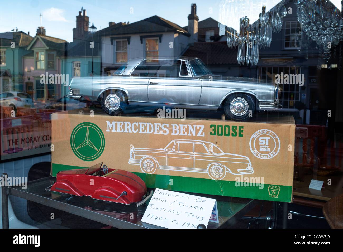 Tinplate toy cars antique shop window Stock Photo - Alamy