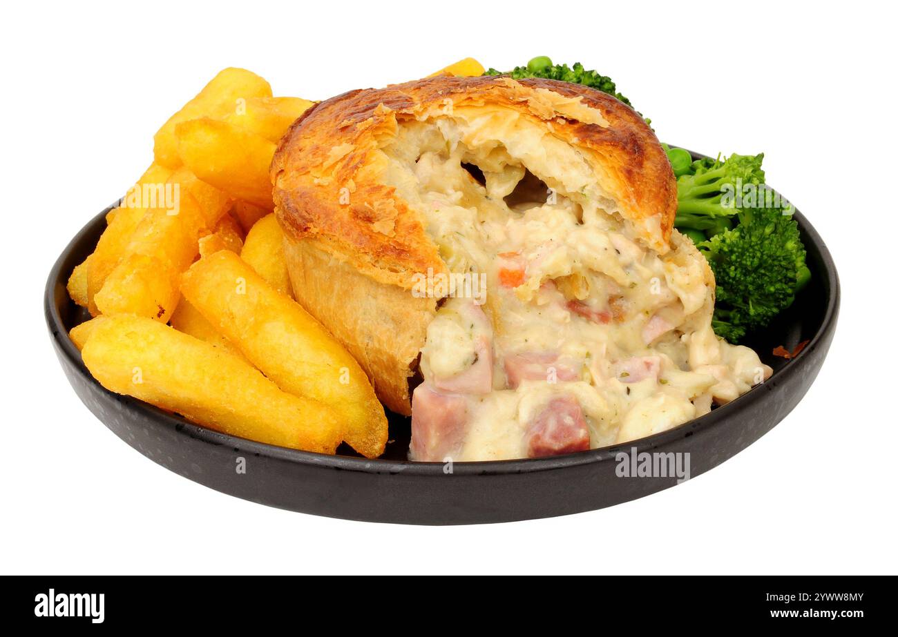 Creamy chicken, ham and leek pie meal with chips and mixed vegetables ...