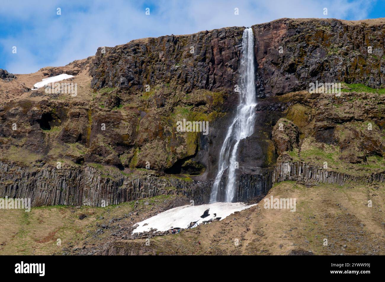 Snæfellsnes Peninsula Iceland, view of waterfall with patch of snow at ...
