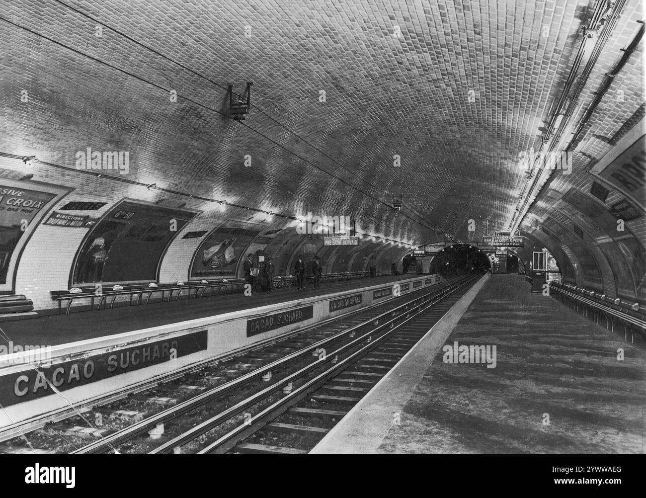 Jaures metro station. Advertisements visible on the walls and edges of ...