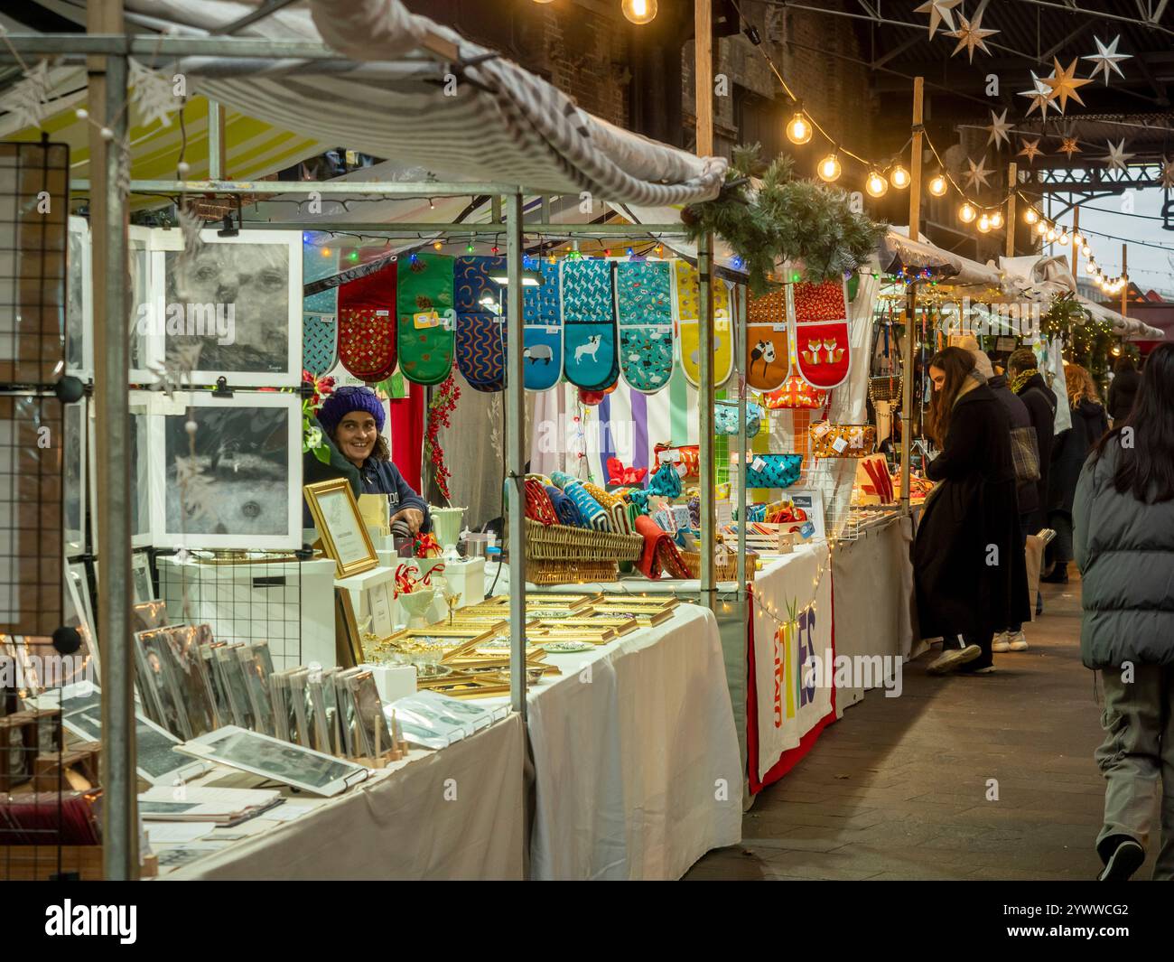 Colorful stalls at Canopy Market in Kings Cross display handmade crafts ...