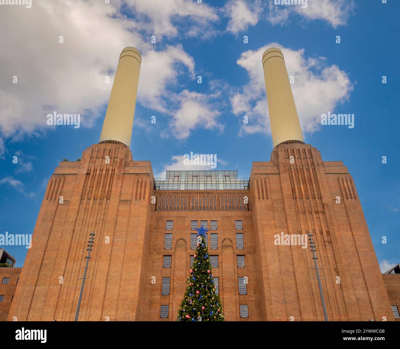 Battersea Power Station towers with Christmas tree in the foreground ...