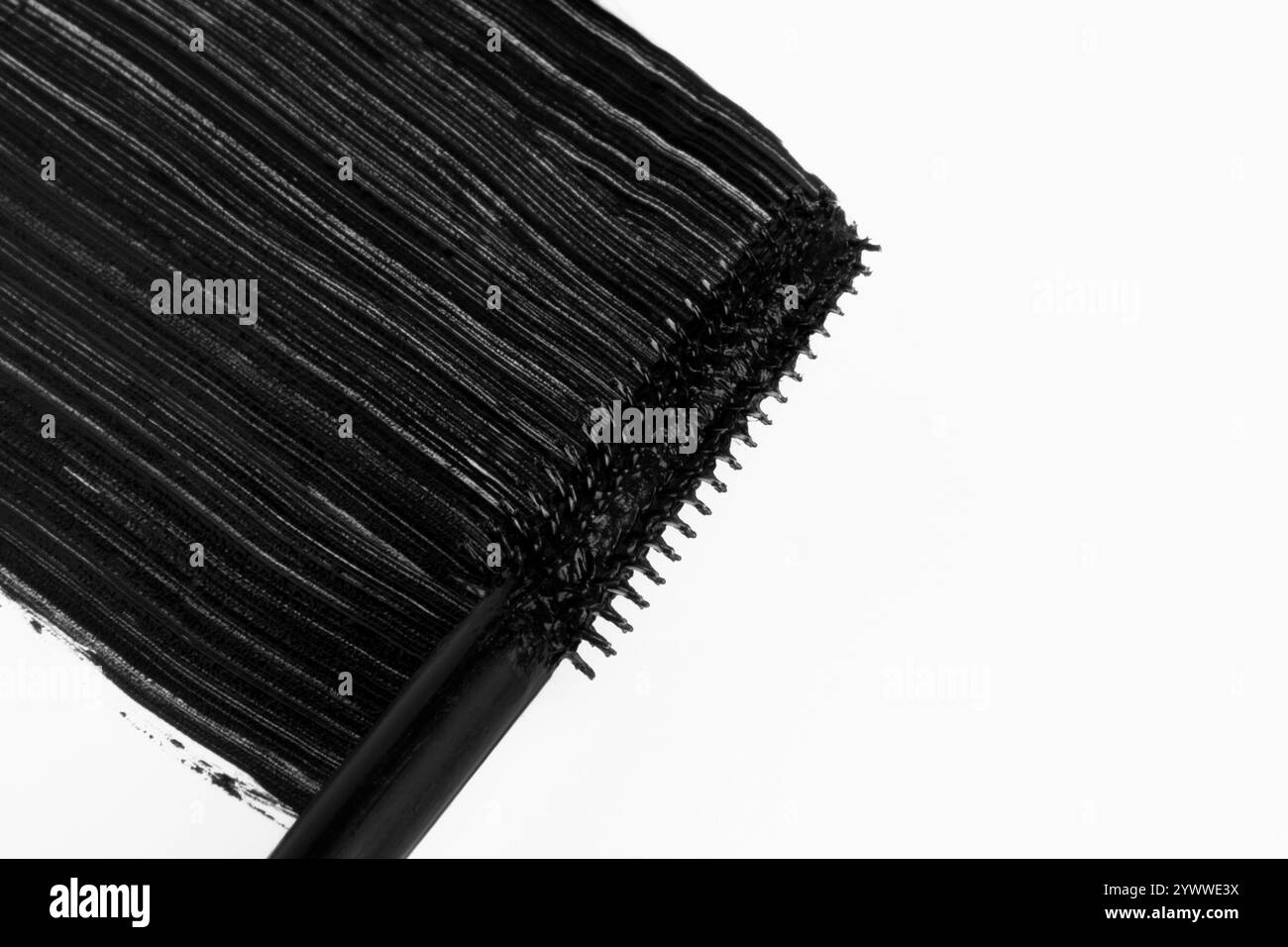 Smudged mascara texture on a light background Stock Photo - Alamy