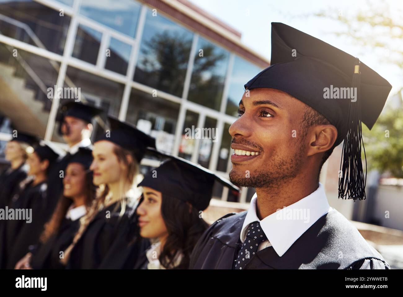 Graduation, ceremony and group with diploma, man and smile for ...