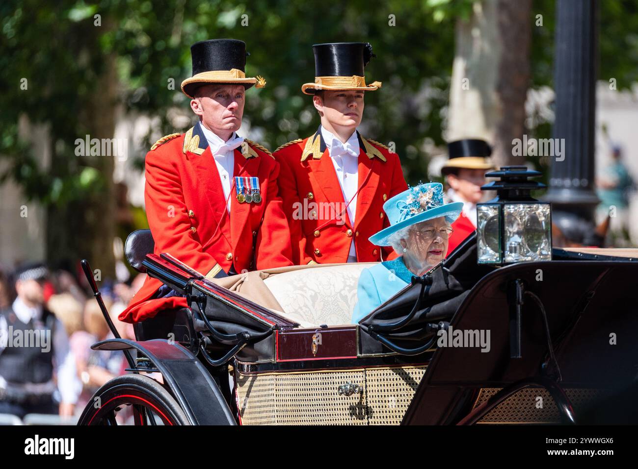 Queen Elizabeth II and footmen at Trooping the Colour 2018, alone in a ...