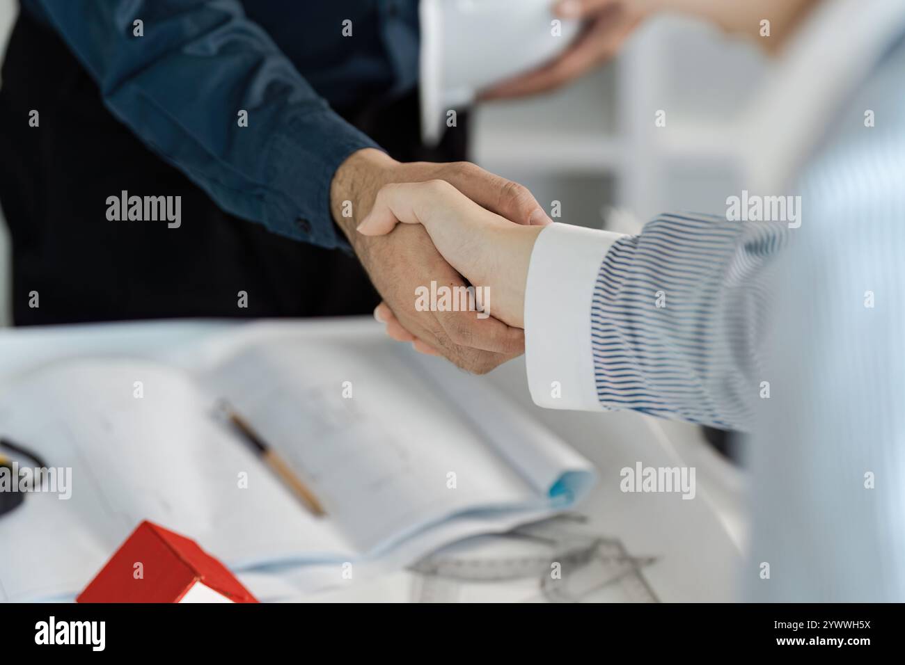 Engineer and architect collaborate on office blueprint business meeting ...