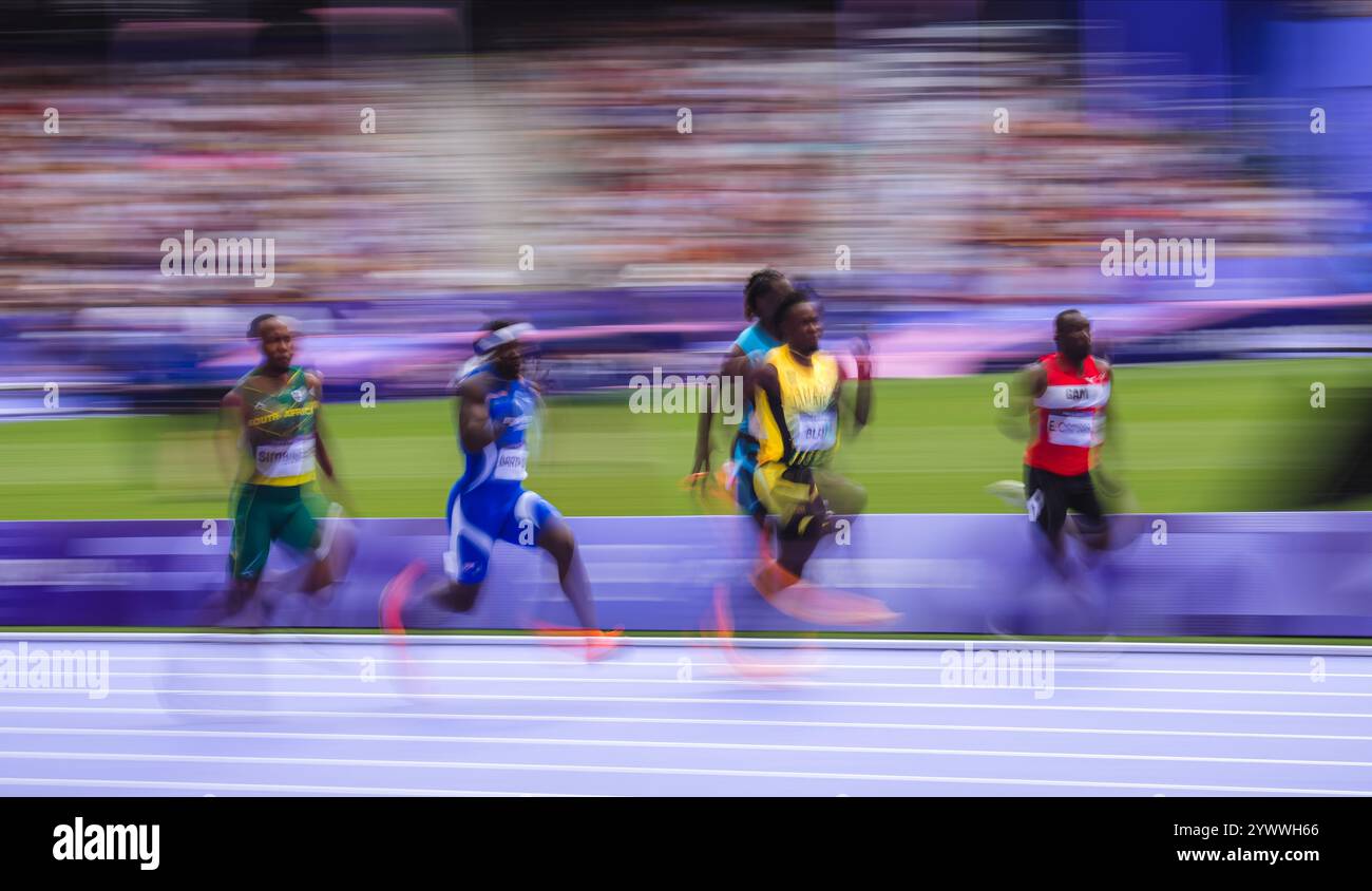 Image of Runners in motion in the 100 meters at the Paris 2024 Olympic ...