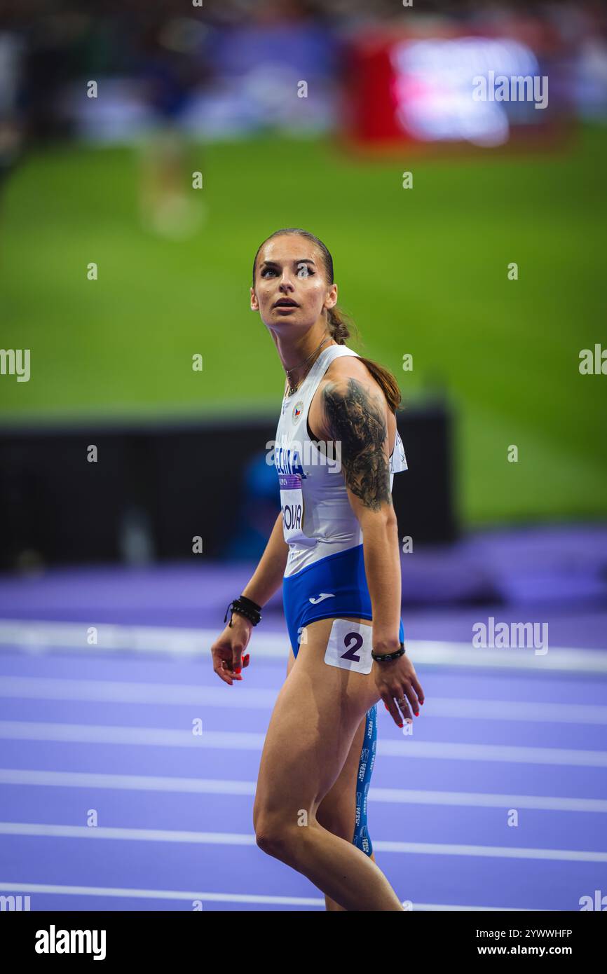 Karolína Maňasová participating in the 100 meters at the Paris 2024 ...
